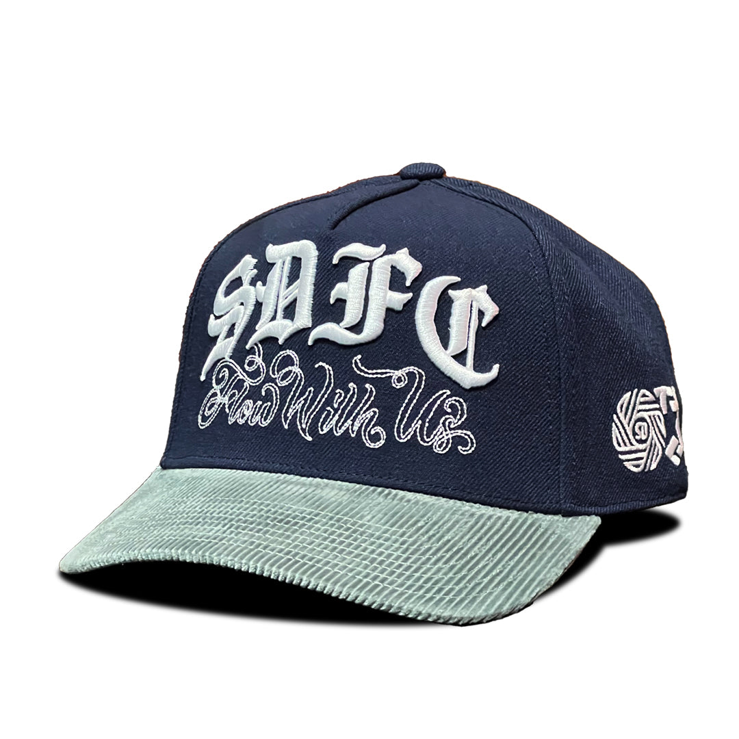 FLOW WITH US - SDFC x Tribal - Mitchell & Ness - Navy/Grey Snapback ...